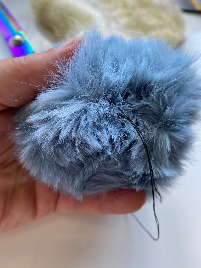 How to make Faux Fur Pom-Poms – The Knit Guru