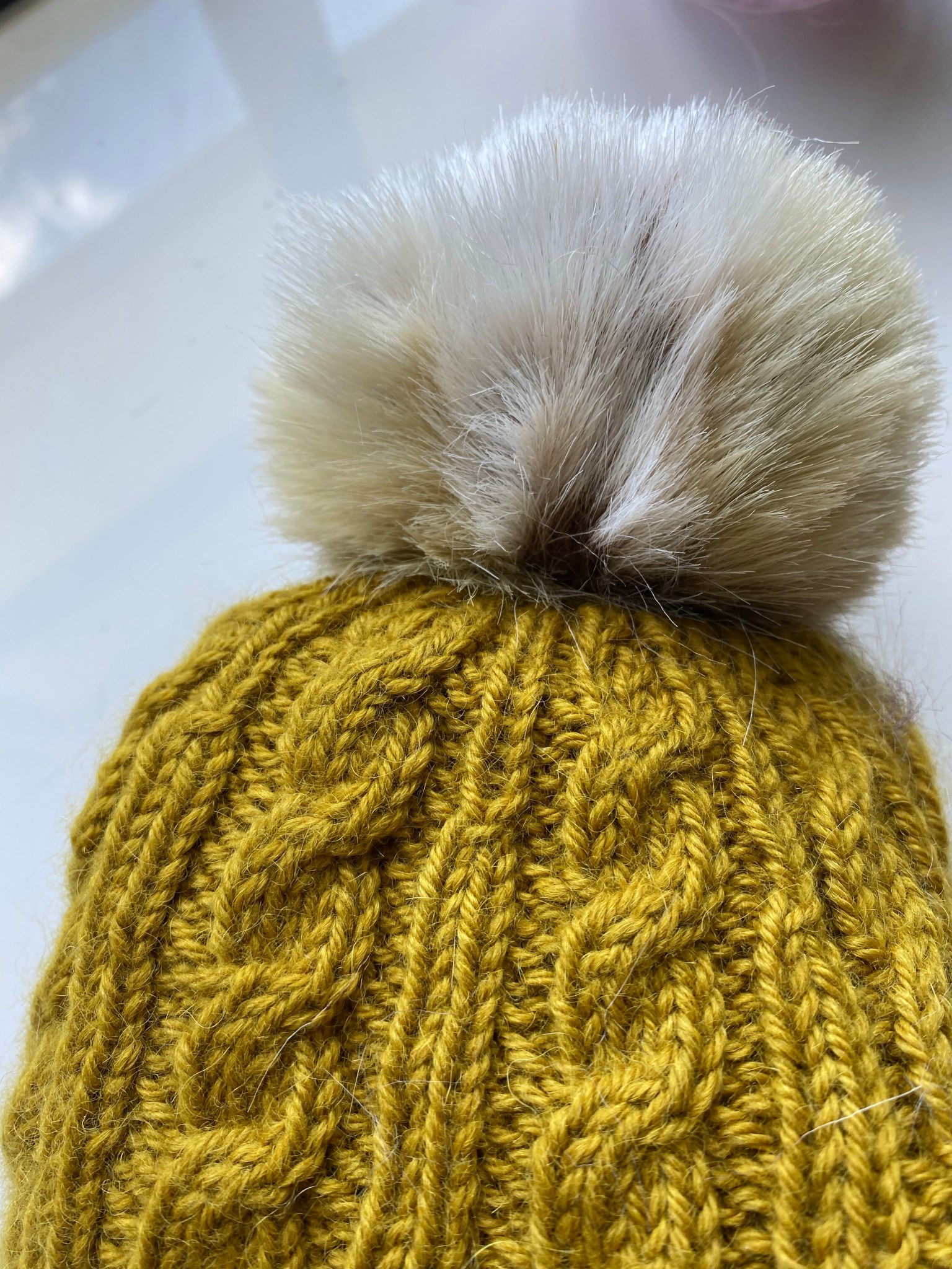 How to make Faux Fur Pom-Poms – The Knit Guru